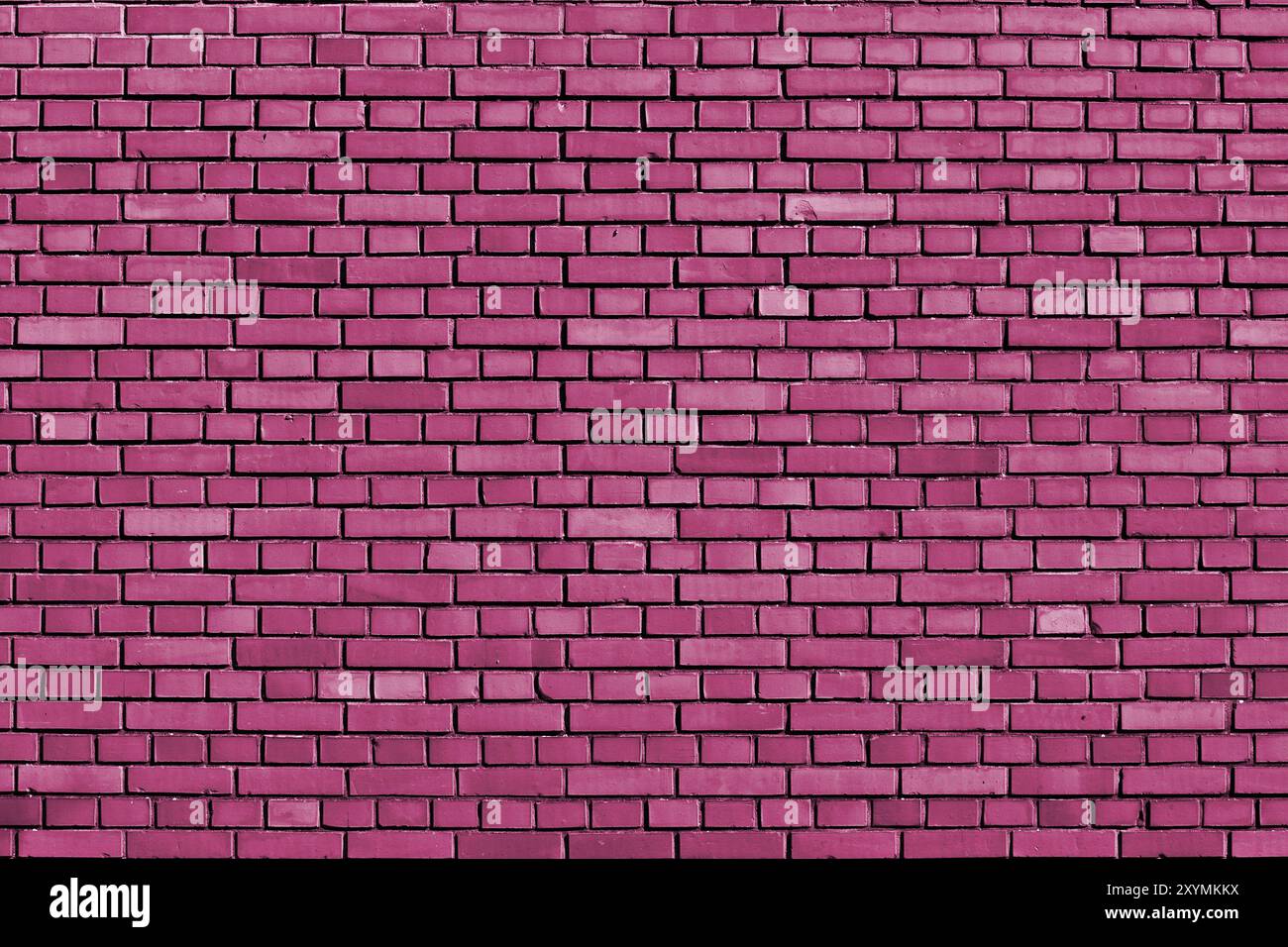 Fuchsia rose colored brick wall background Stock Photo - Alamy