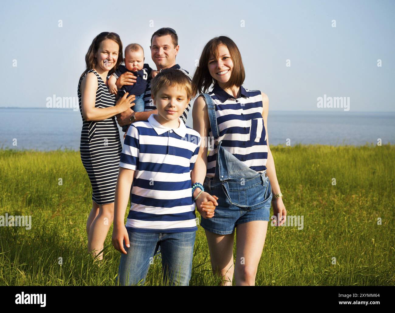 Portrait of the family with three children near the sea Stock Photo - Alamy