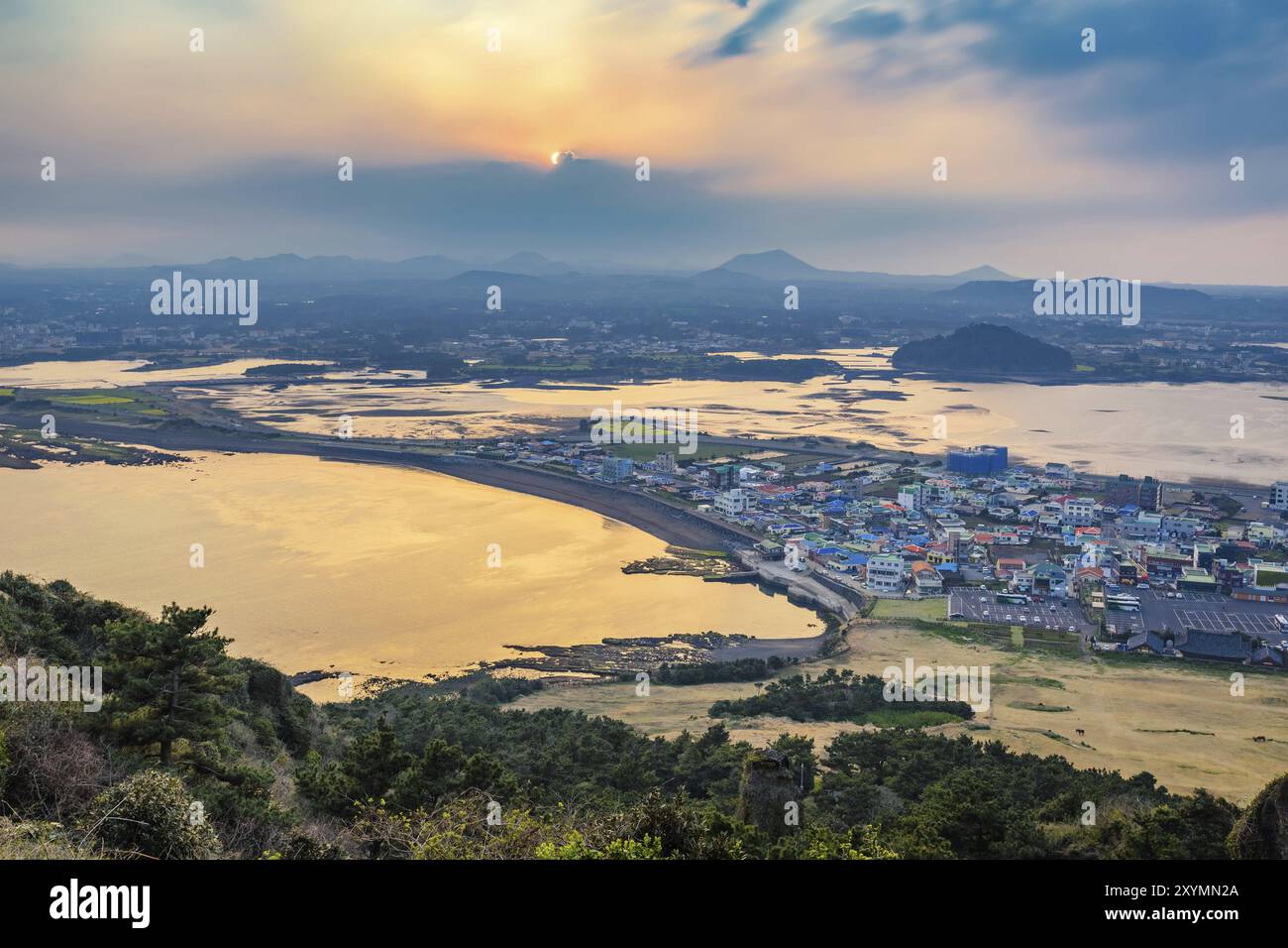 Jeju city skyline when sunset view from Seongsan Ilchulbong, Jeju ...