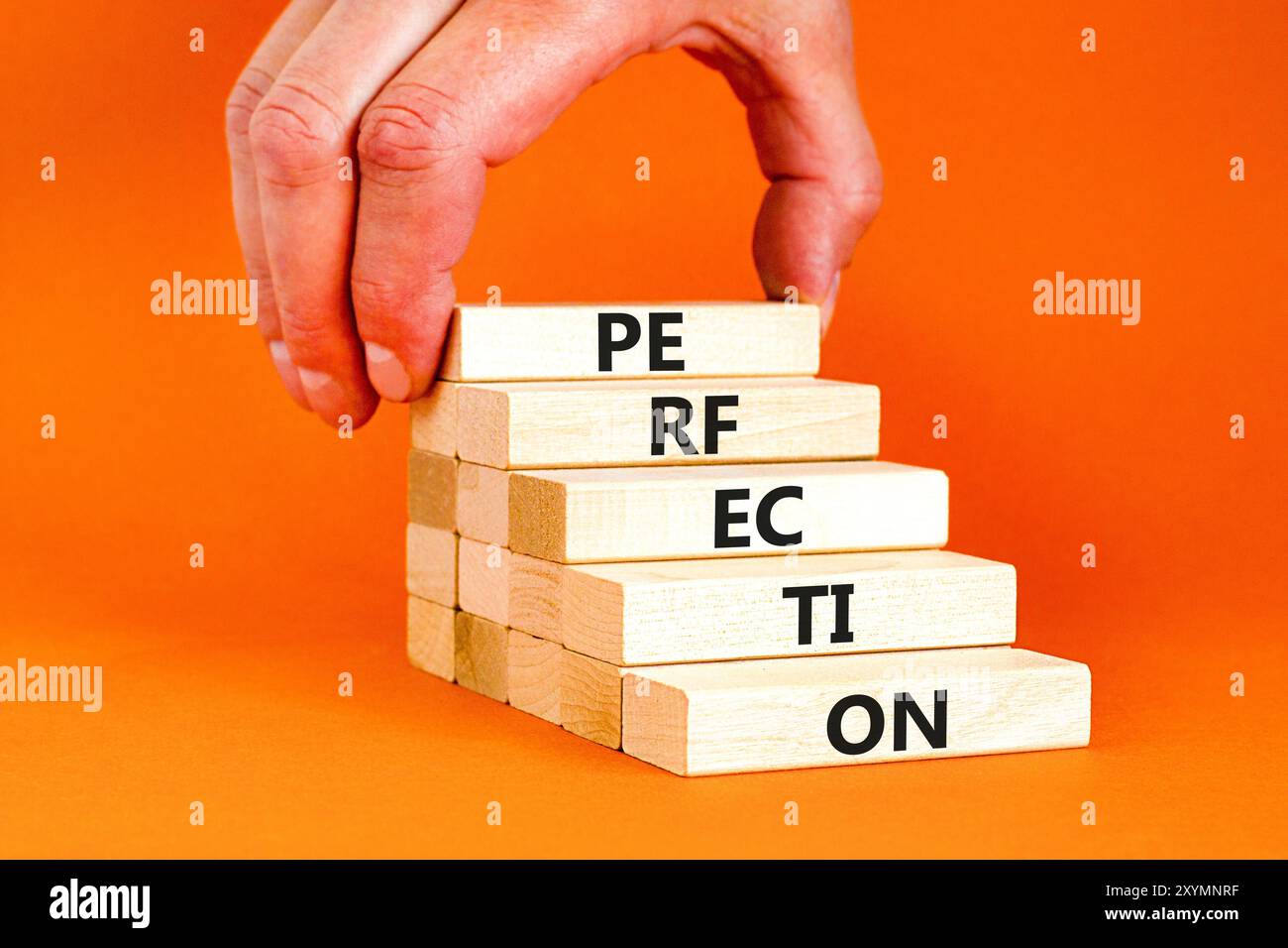 Perfection symbol. Concept word Perfection on beautiful wooden blocks ...