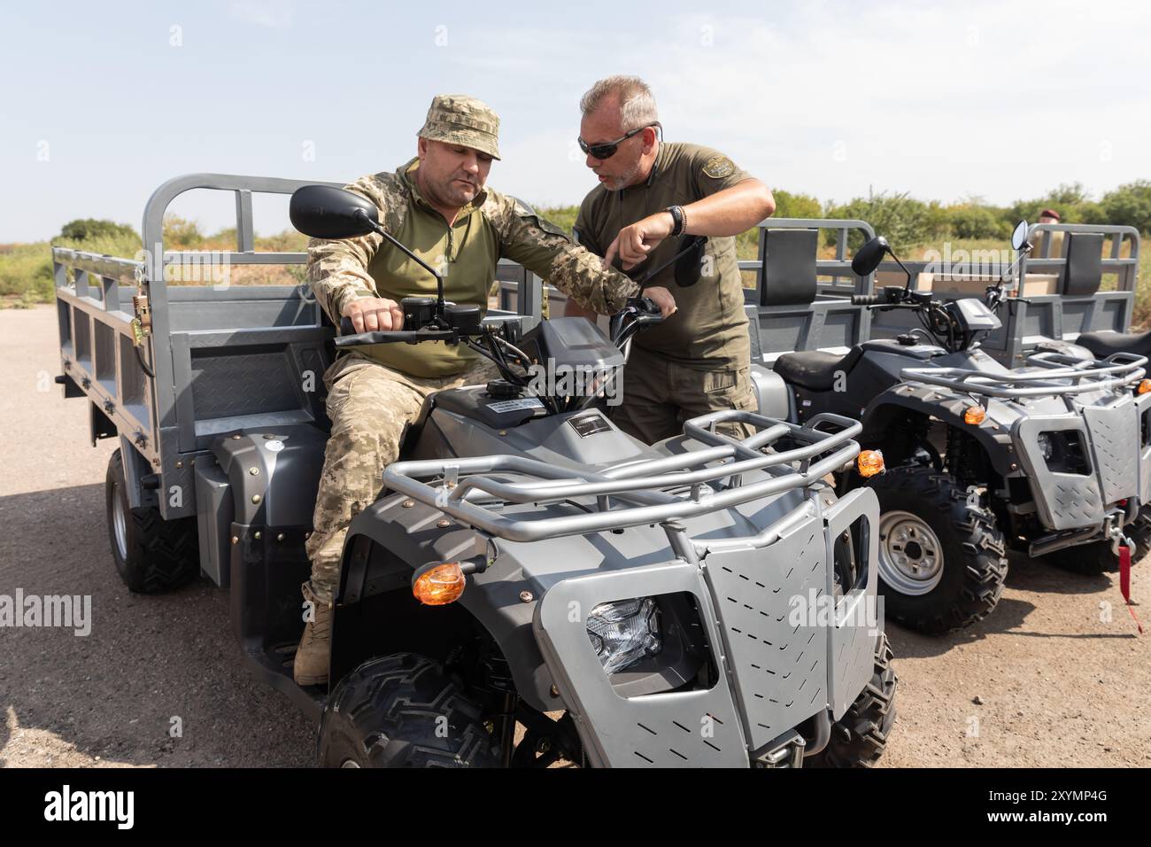 DONETSK Reg, UKRAINE - Aug. 29, 2024: Military personnel inspecting ...