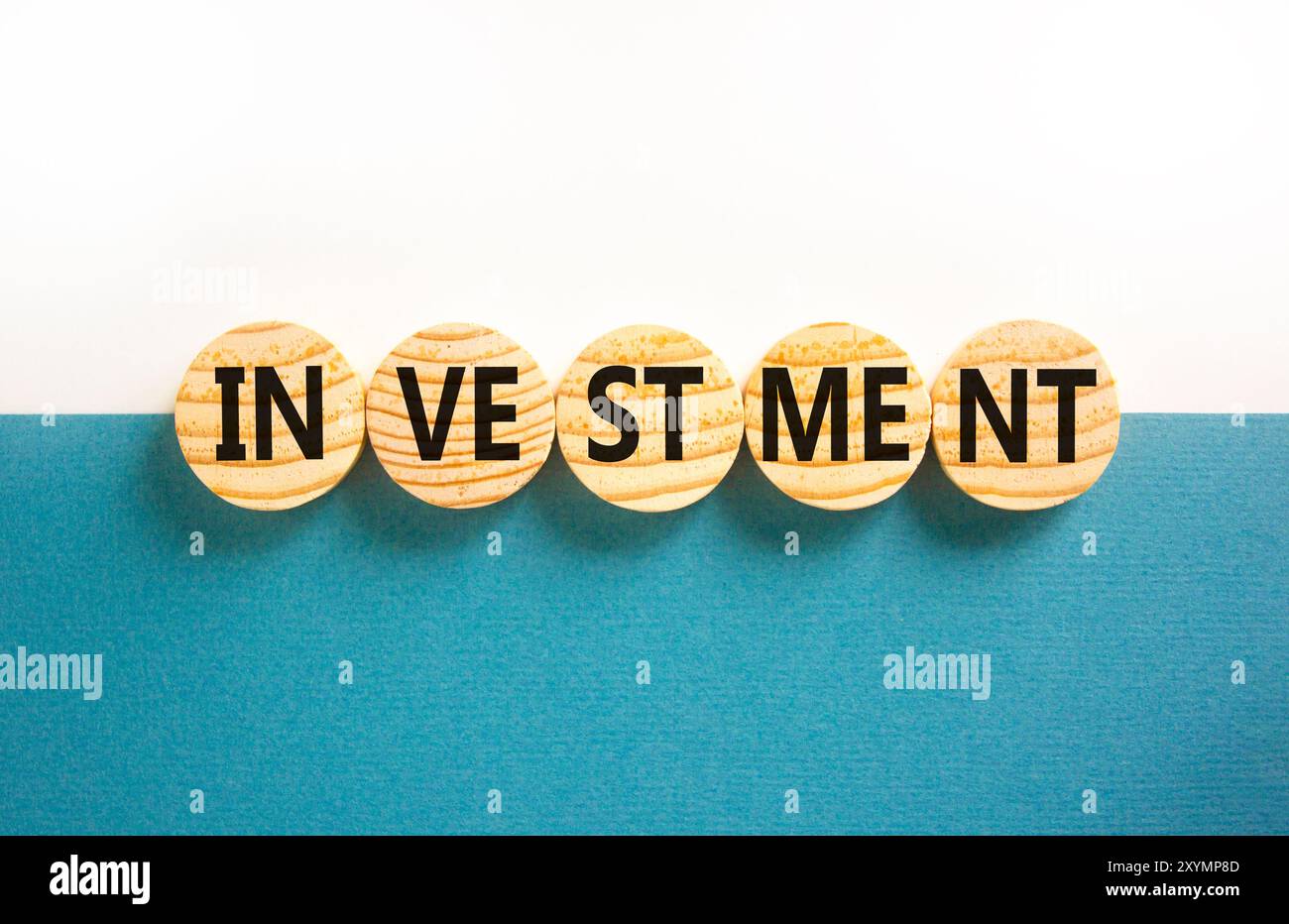 Investment symbol. Concept word Investment on beautiful wooden circles ...