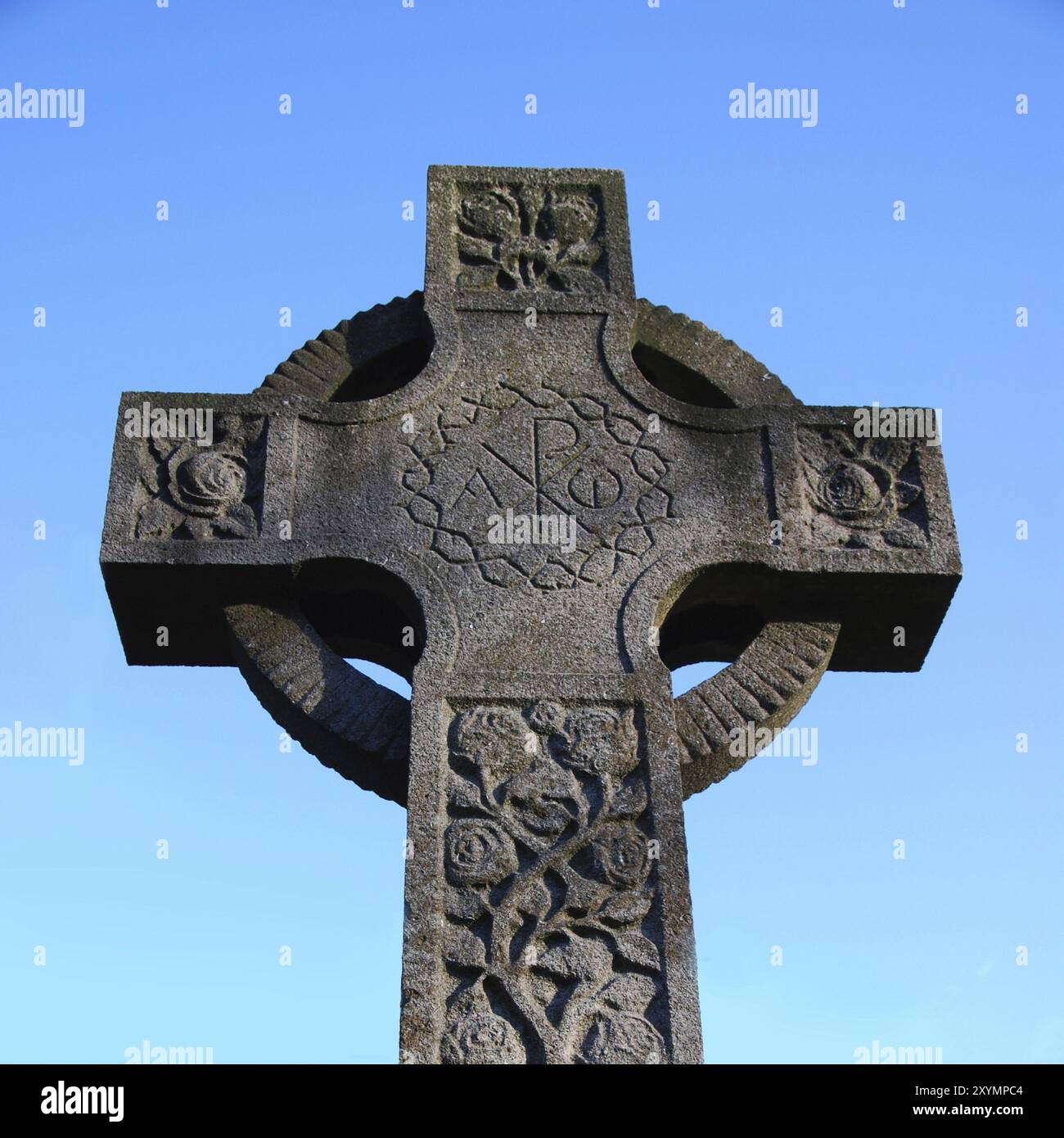 Tombstone in shape of a cross on a cemetery Stock Photo - Alamy