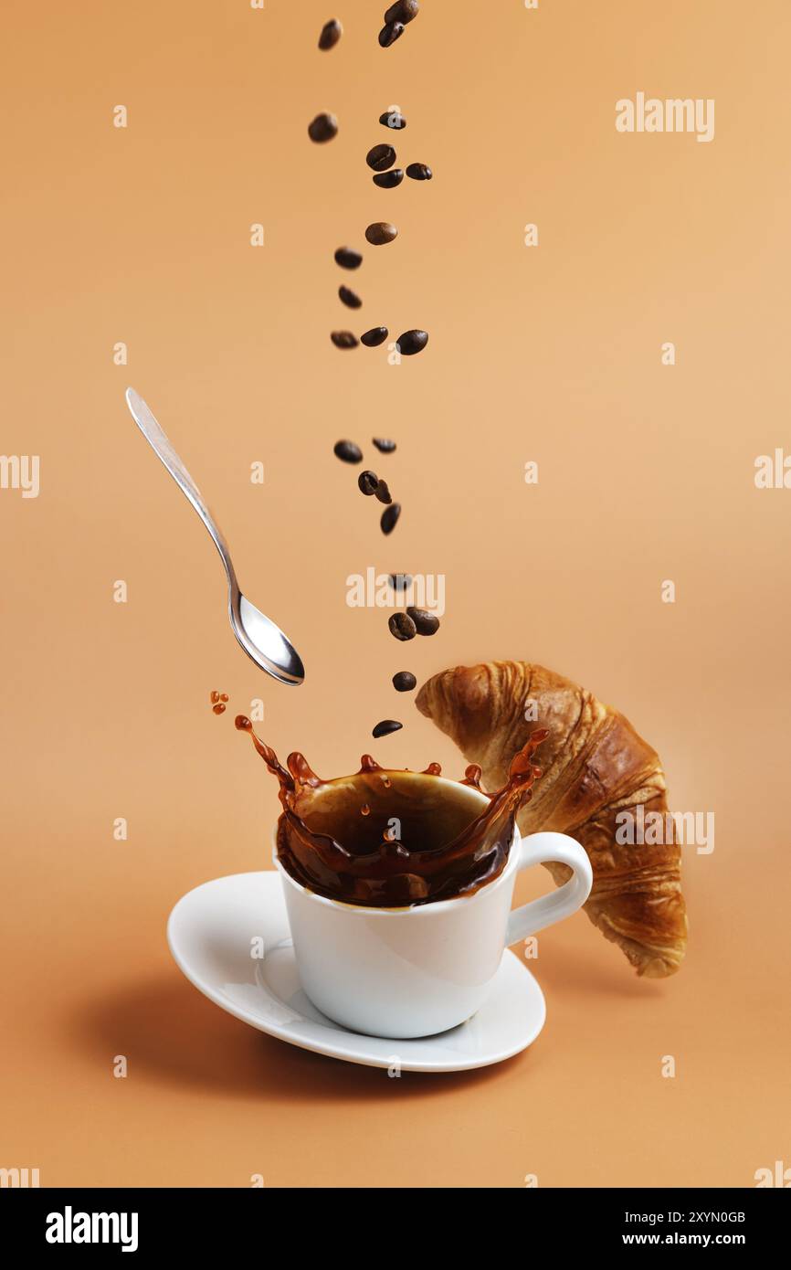 Falling coffee beans on light hi-res stock photography and images - Alamy