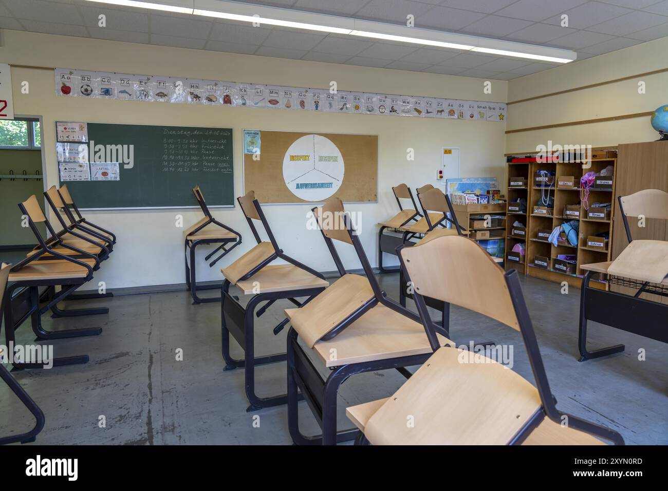 Classroom of a fourth grade, after school, the building is older but in ...