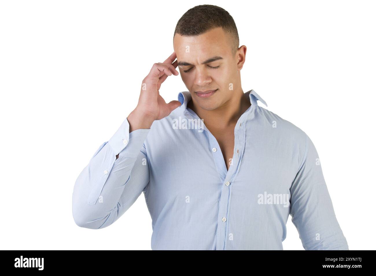 Man suffering from an headache, holding his hand to the head, isolated ...