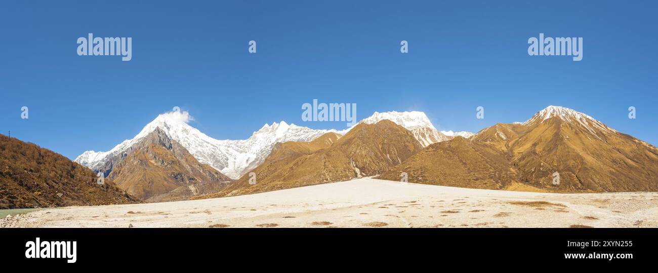 Panoramic landscape view of snow capped Himalayan mountain range and ...