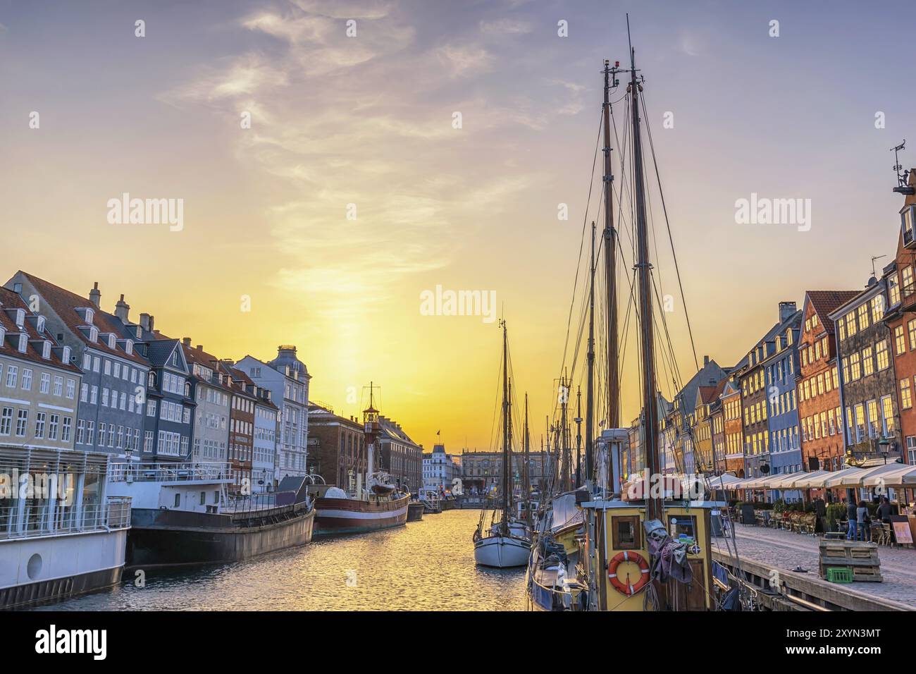 Copenhagen Denmark, sunset city skyline at Nyhavn harbour with ...