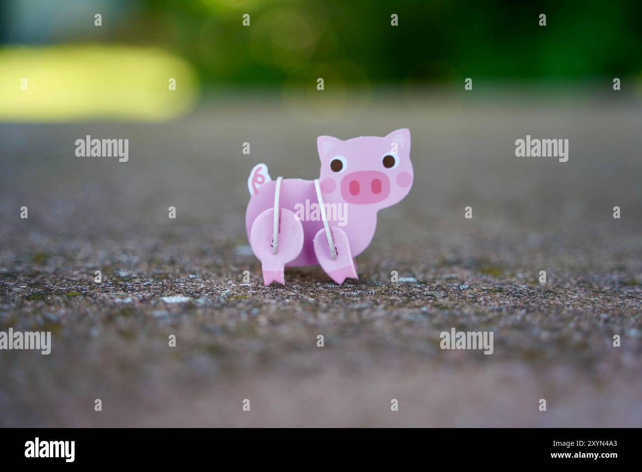 Small cute pink pig cardboard figure. Animal figurine toy Stock Photo ...