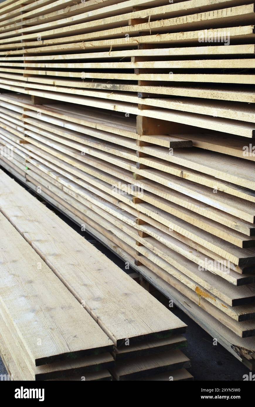 Stacked wooden strips in a carpenter´s workshop Stock Photo - Alamy