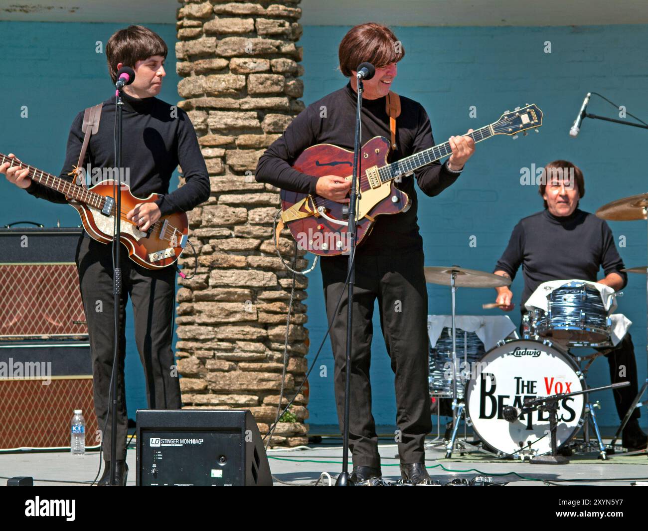 Am early Beatles tribute band performs outside at Rottingdean Stock ...