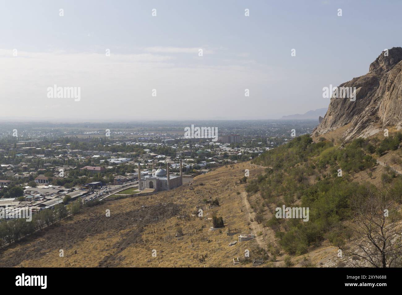 View of a mosque from the sacred Sulaiman Mountain in Osh, Kyrgyzstan ...