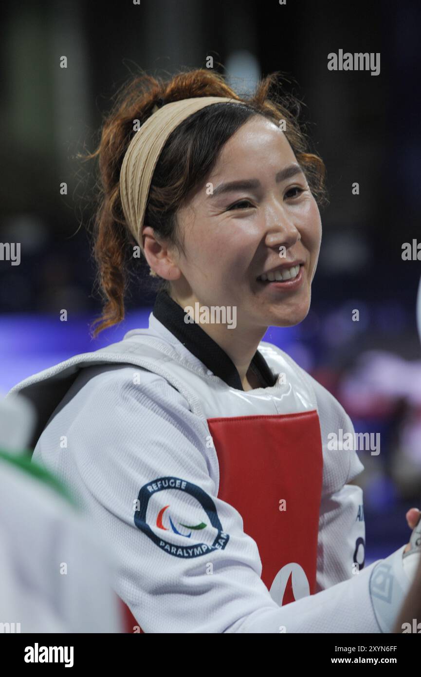 Zakia Khudadadi (RPT) looking happy after securing a bronze medal in ...