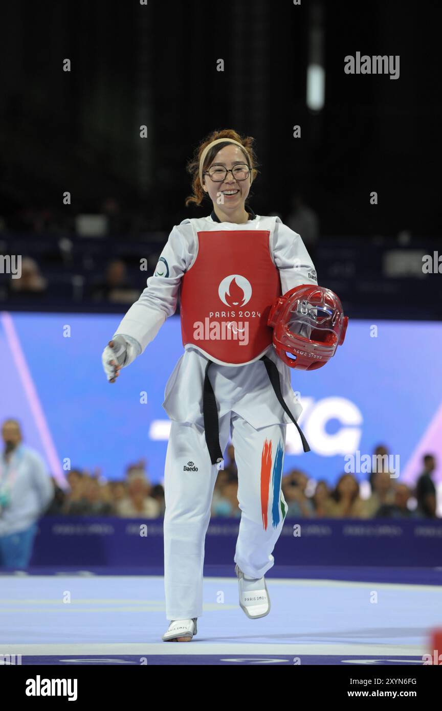 Zakia Khudadadi (RPT) looking happy after securing a bronze medal in ...