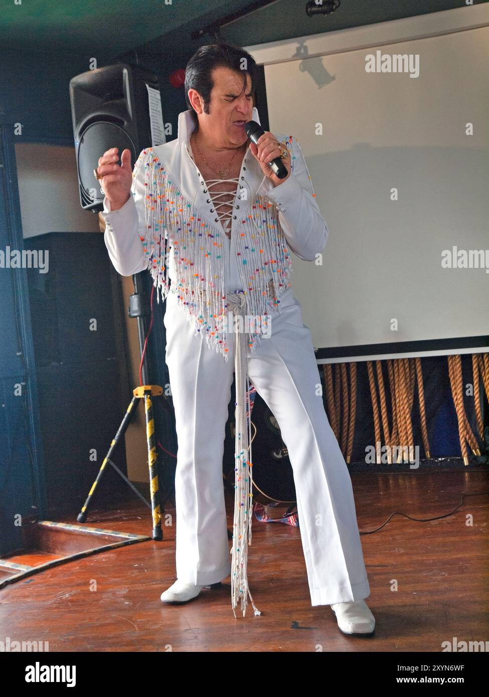 An Elvis tribute act at a Brighton pub Stock Photo - Alamy