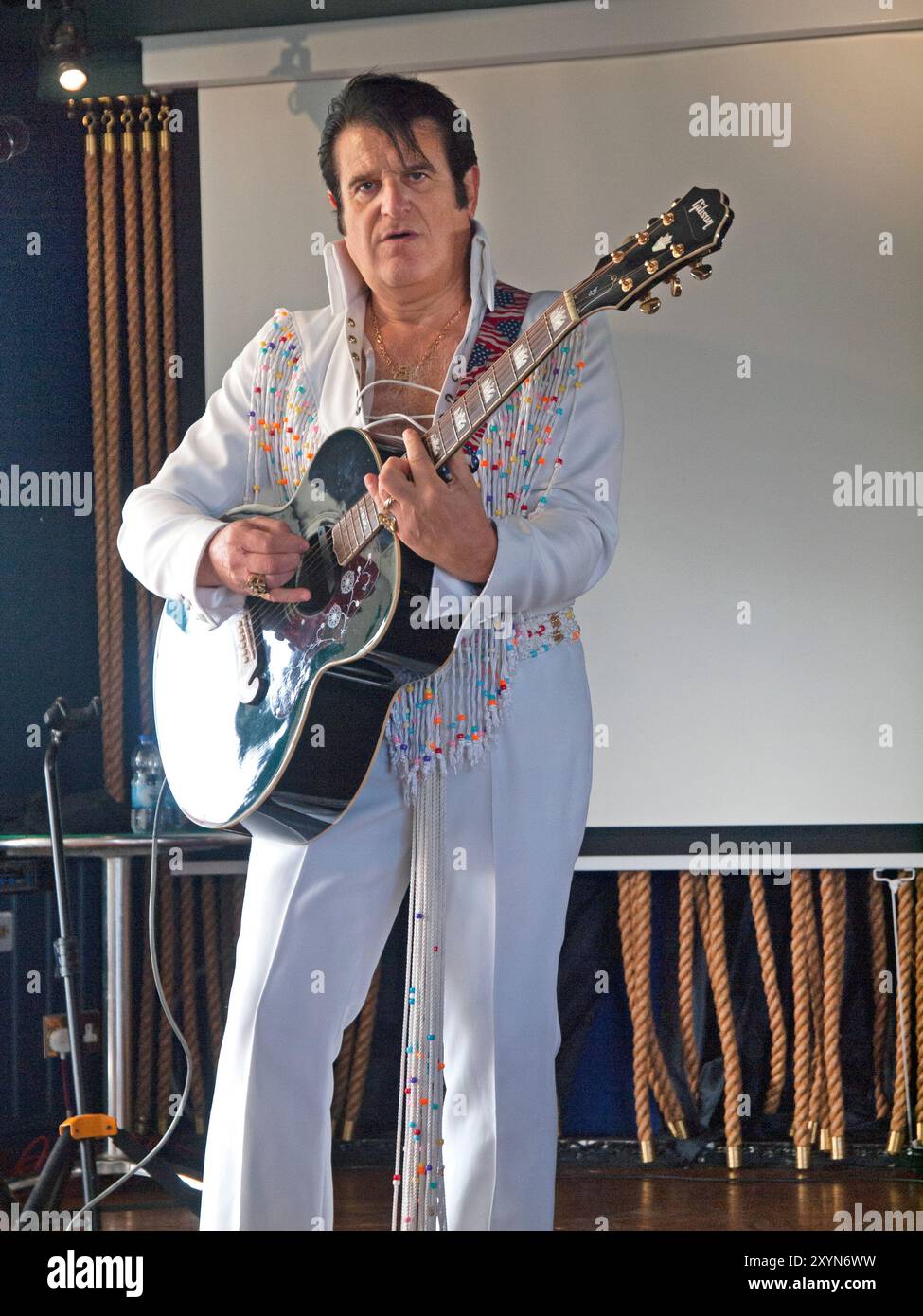 An Elvis tribute act at a Brighton pub Stock Photo - Alamy