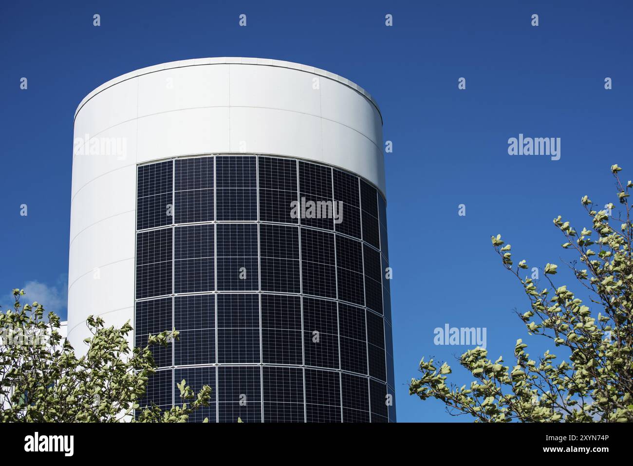 Solar panels mounted on the exterior of a large tank Stock Photo - Alamy