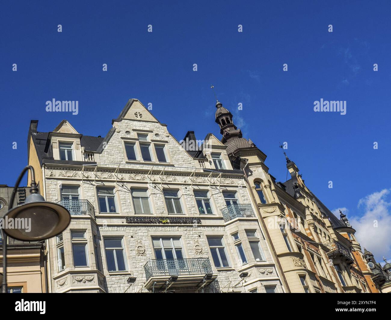 Several residential buildings with balconies and architectural details ...