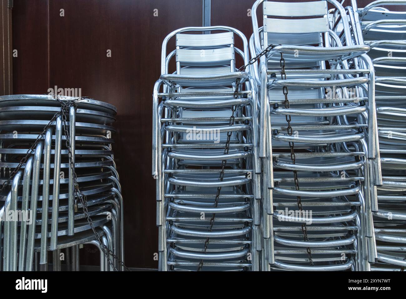 Stack of chairs for a kiosk in Barcelona, Spain, Europe Stock Photo - Alamy