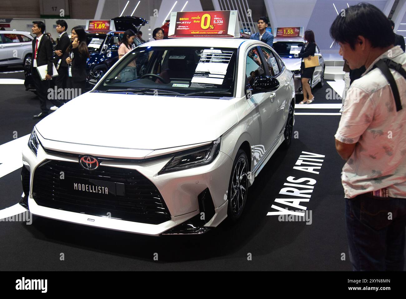 Visitors inspect a Toyota Yaris Ativ car during the Thailand Big Motor ...