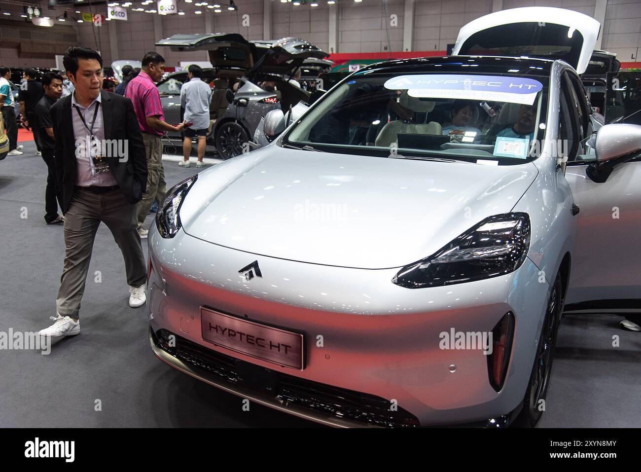 Visitors inspect a AION Hyptec HT car during the Thailand Big Motor ...