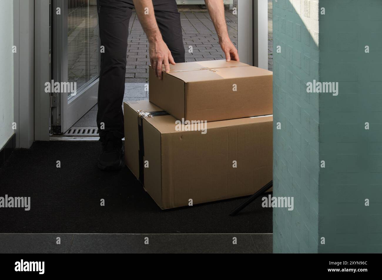 Packages at the front door hi-res stock photography and images - Alamy