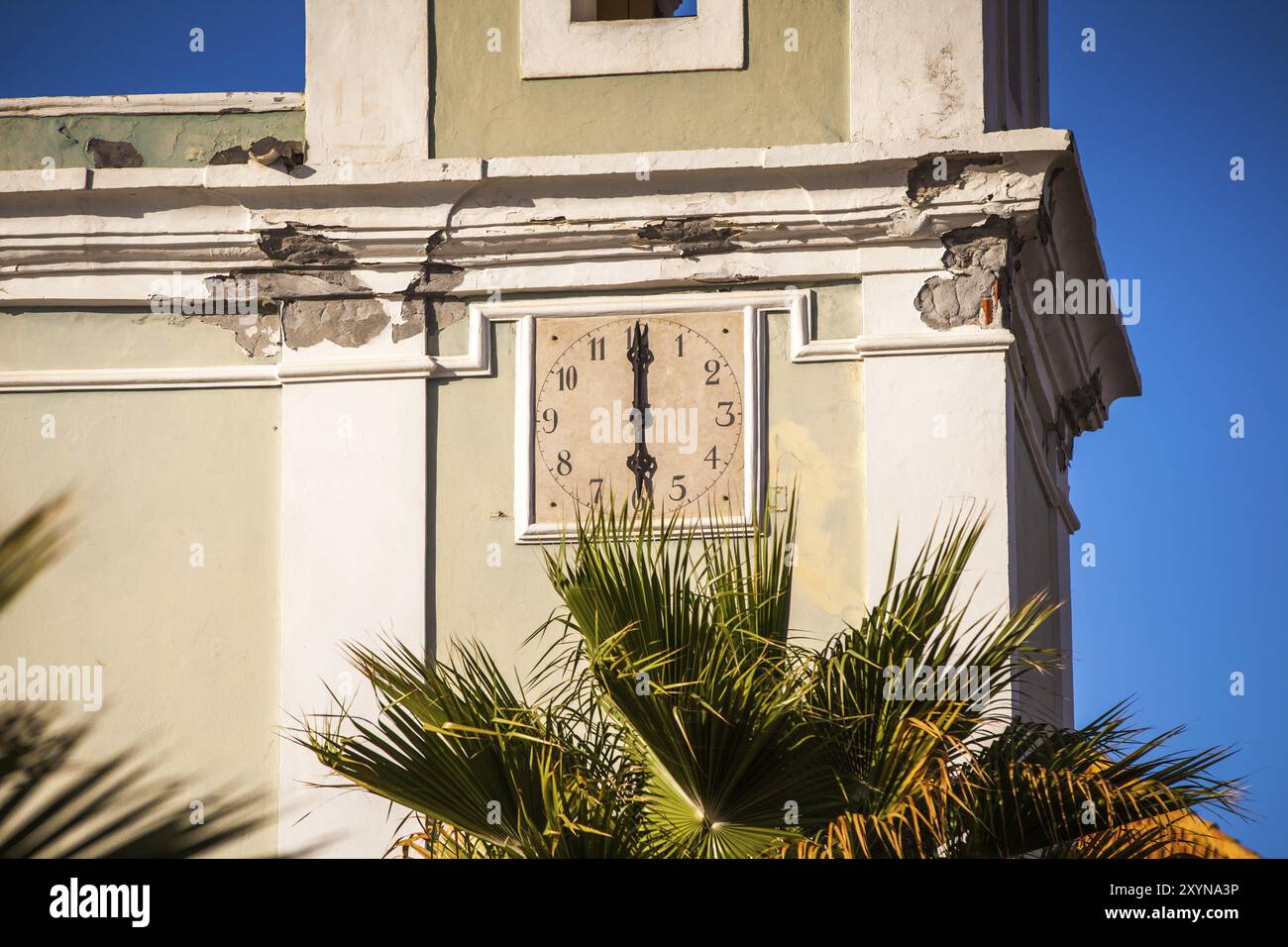 Beige tower clock on the church facade at six o'clock Stock Photo - Alamy