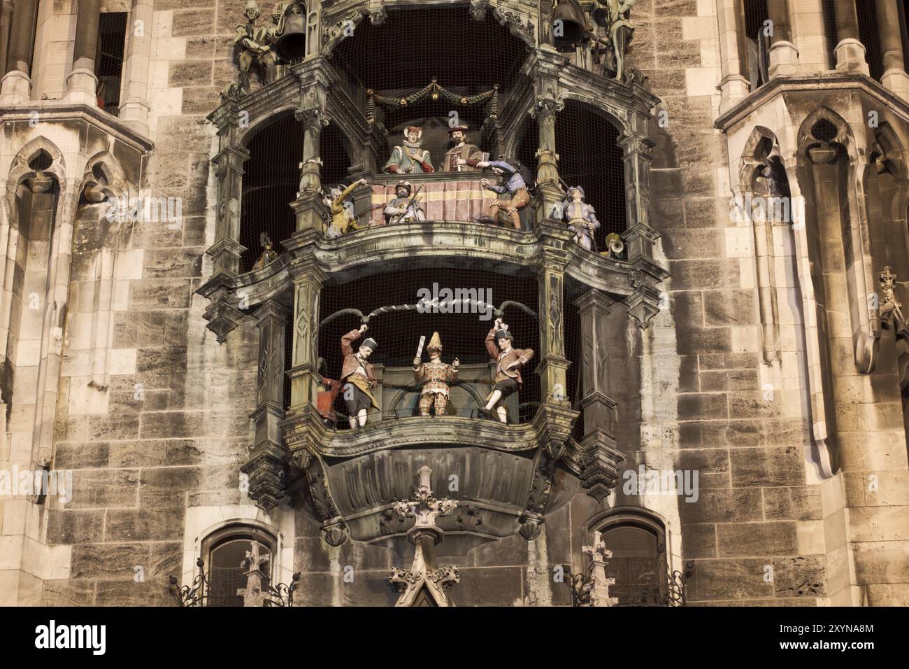 The carillon at Munich's new town hall at night Stock Photo - Alamy