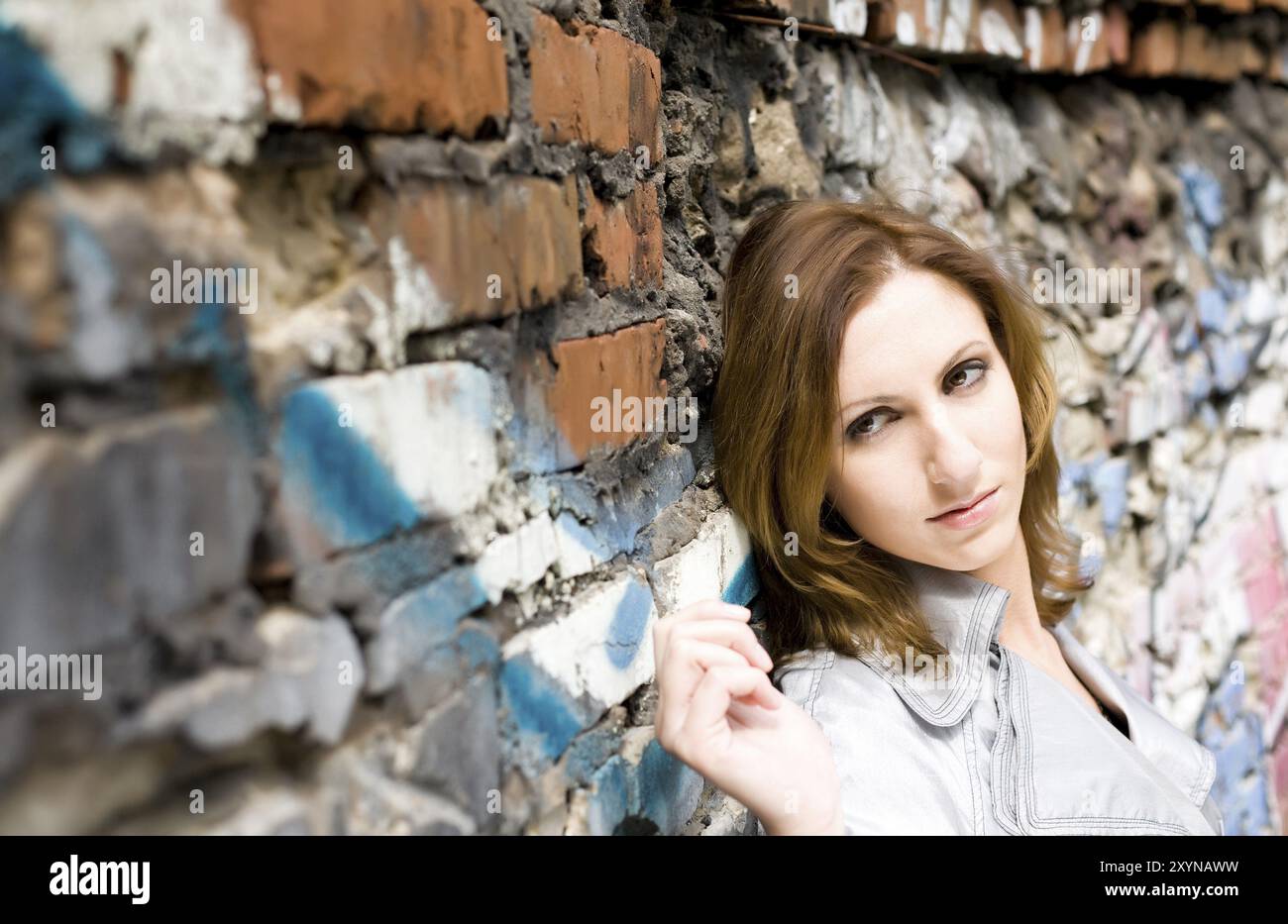 Lean leans leaning against wall walls hi-res stock photography and ...