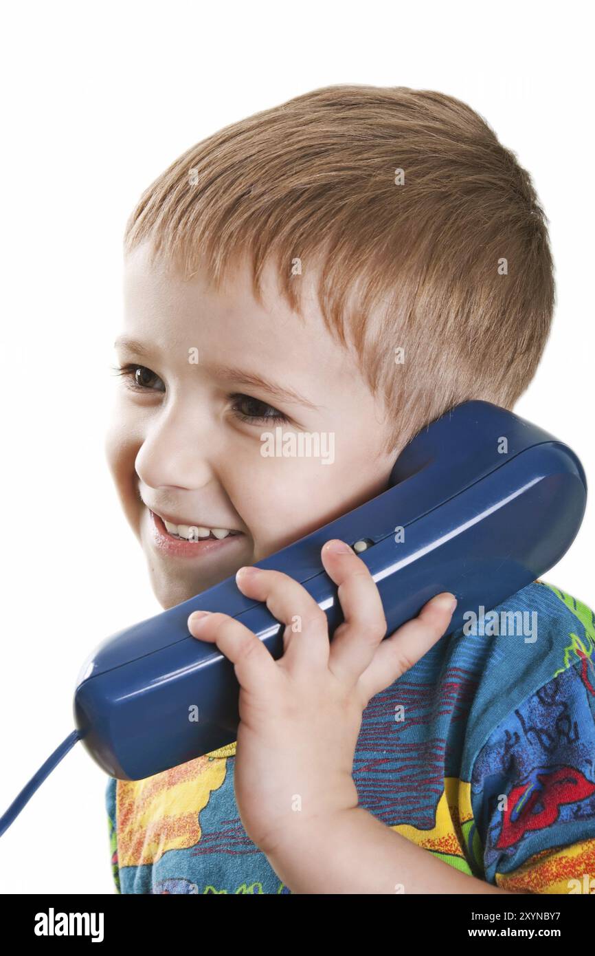 Communication, little child talking telephone Stock Photo - Alamy