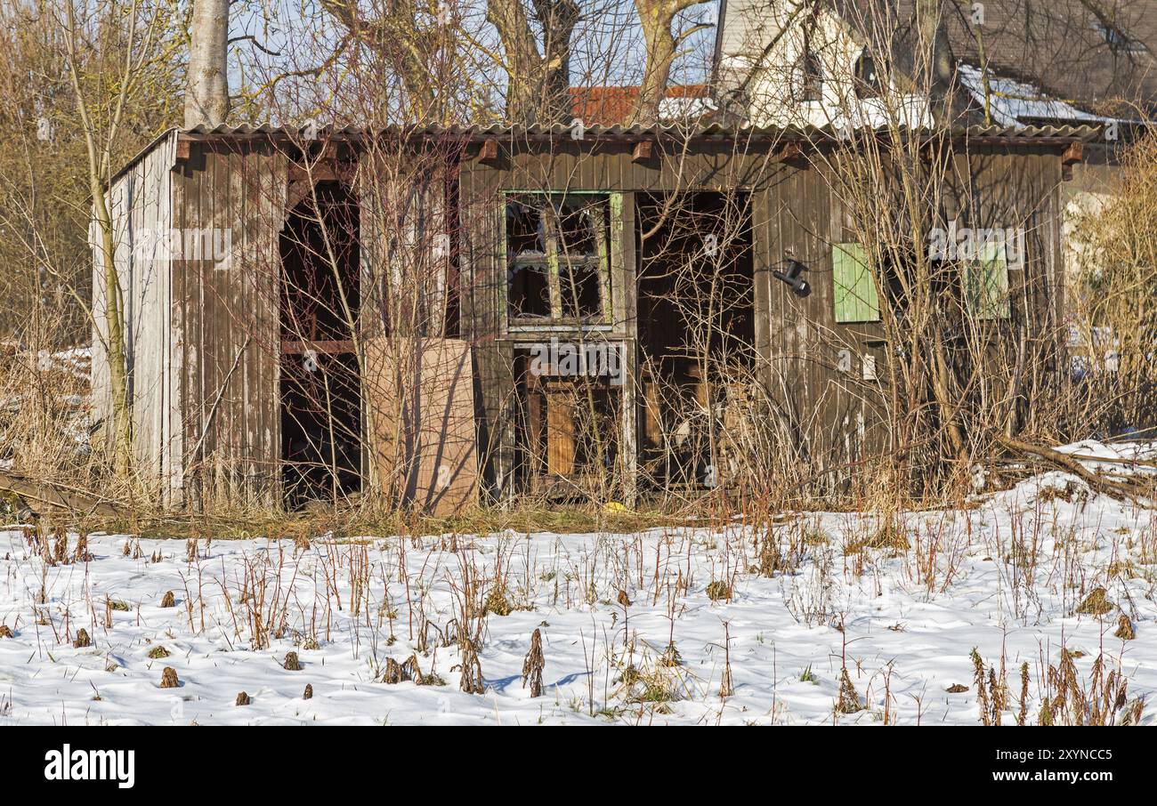 Old dilapidated hut in the snow Stock Photo - Alamy