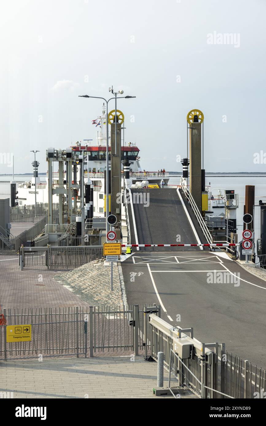 Ferry docking at Holwert pier, ferry terminal, Holwerd, Friesland ...