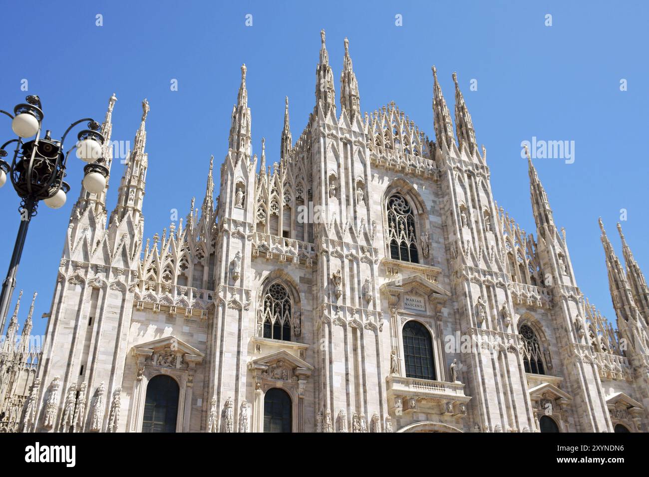 Gothic facade of Milan Cathedral in Piazza Duomo. It is the fourth ...