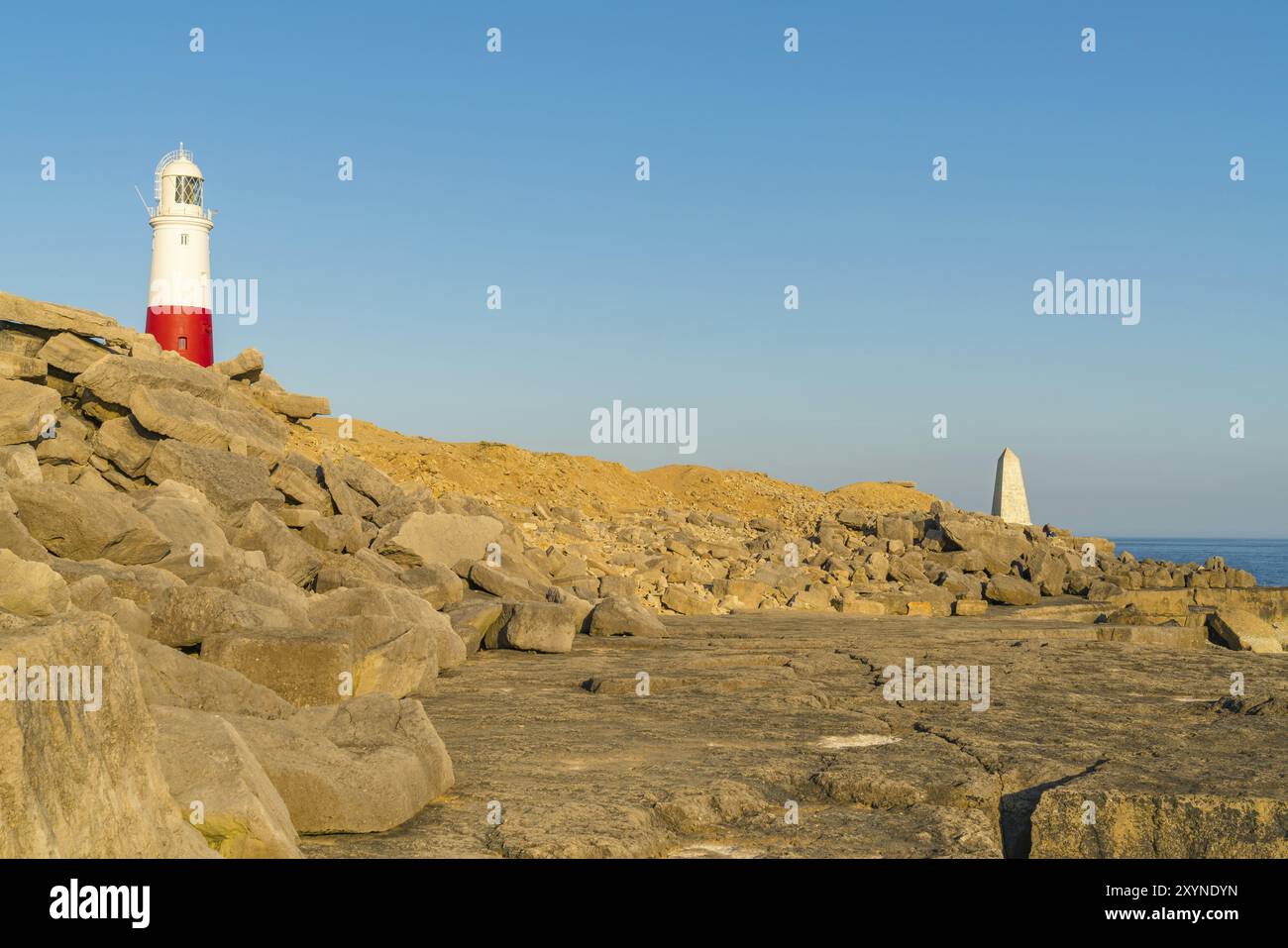 Portland Bill Lighthouse seen from the rocks near Pulpit Rock, Jurassic ...