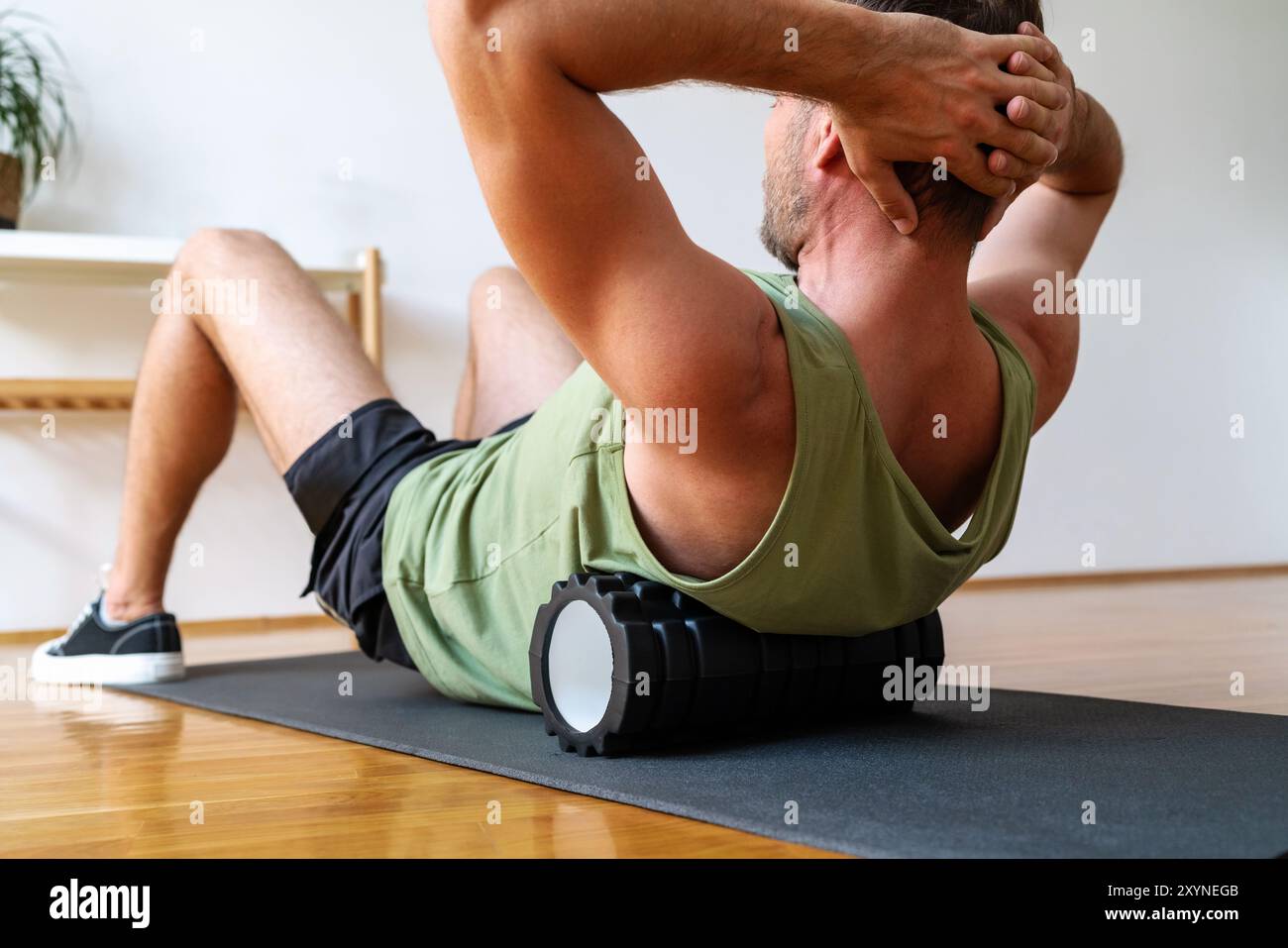 Foam roller back exercise home hi-res stock photography and images - Alamy