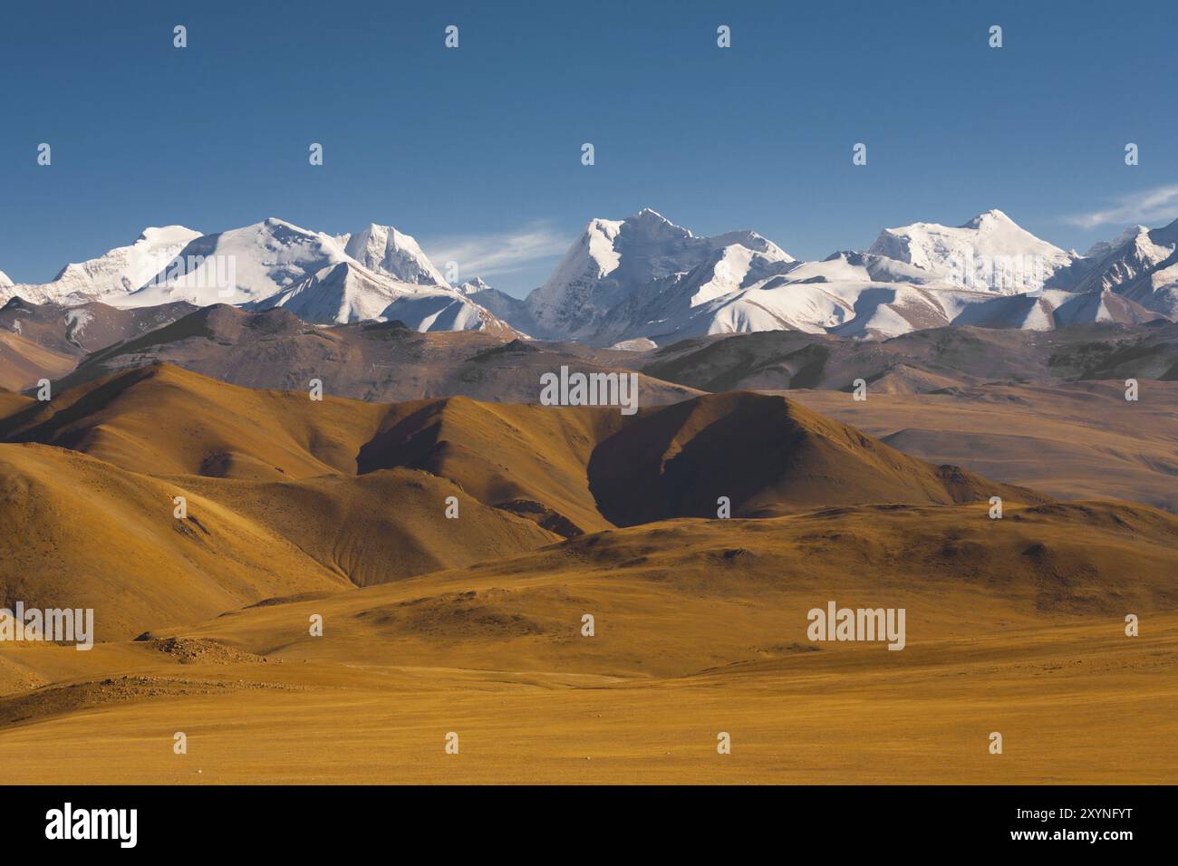 Peaks of the himalayas poke through the beautiful natural landscape of ...