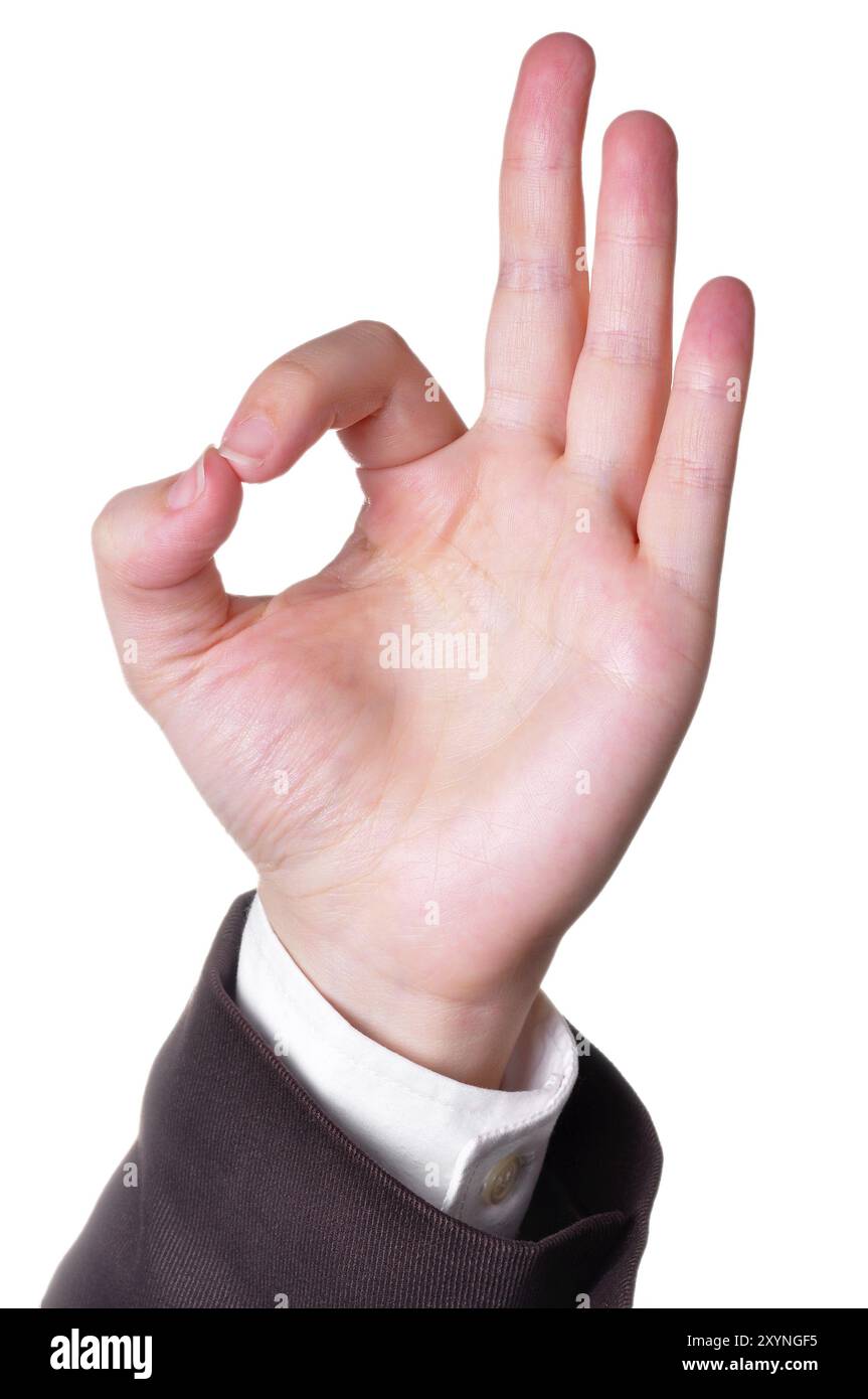 Hand in a suit making the OK sign isolated in white background Stock ...
