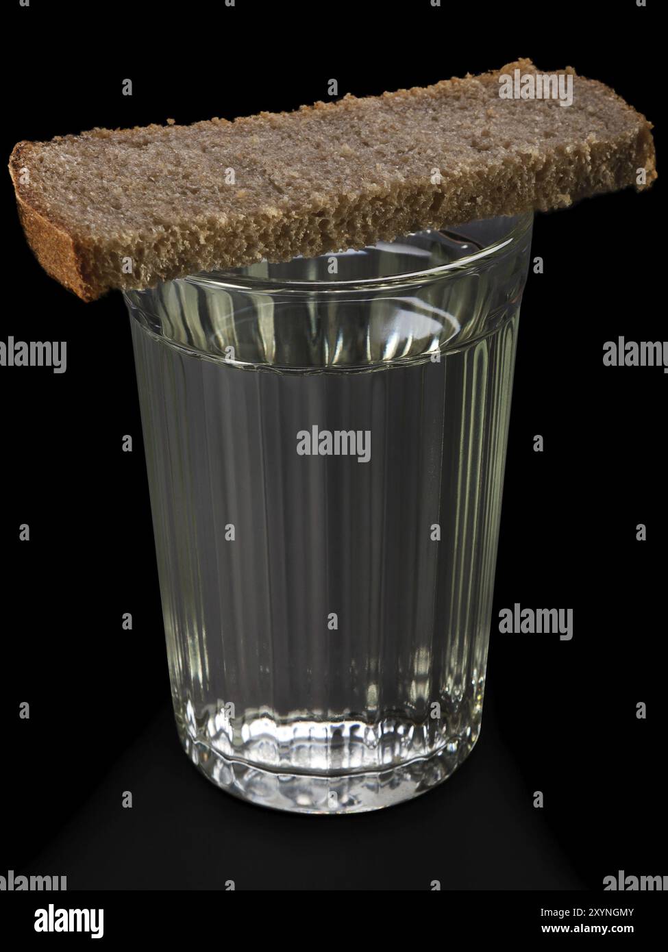 Bread food portion on vodka alcohol drinking glass Stock Photo - Alamy