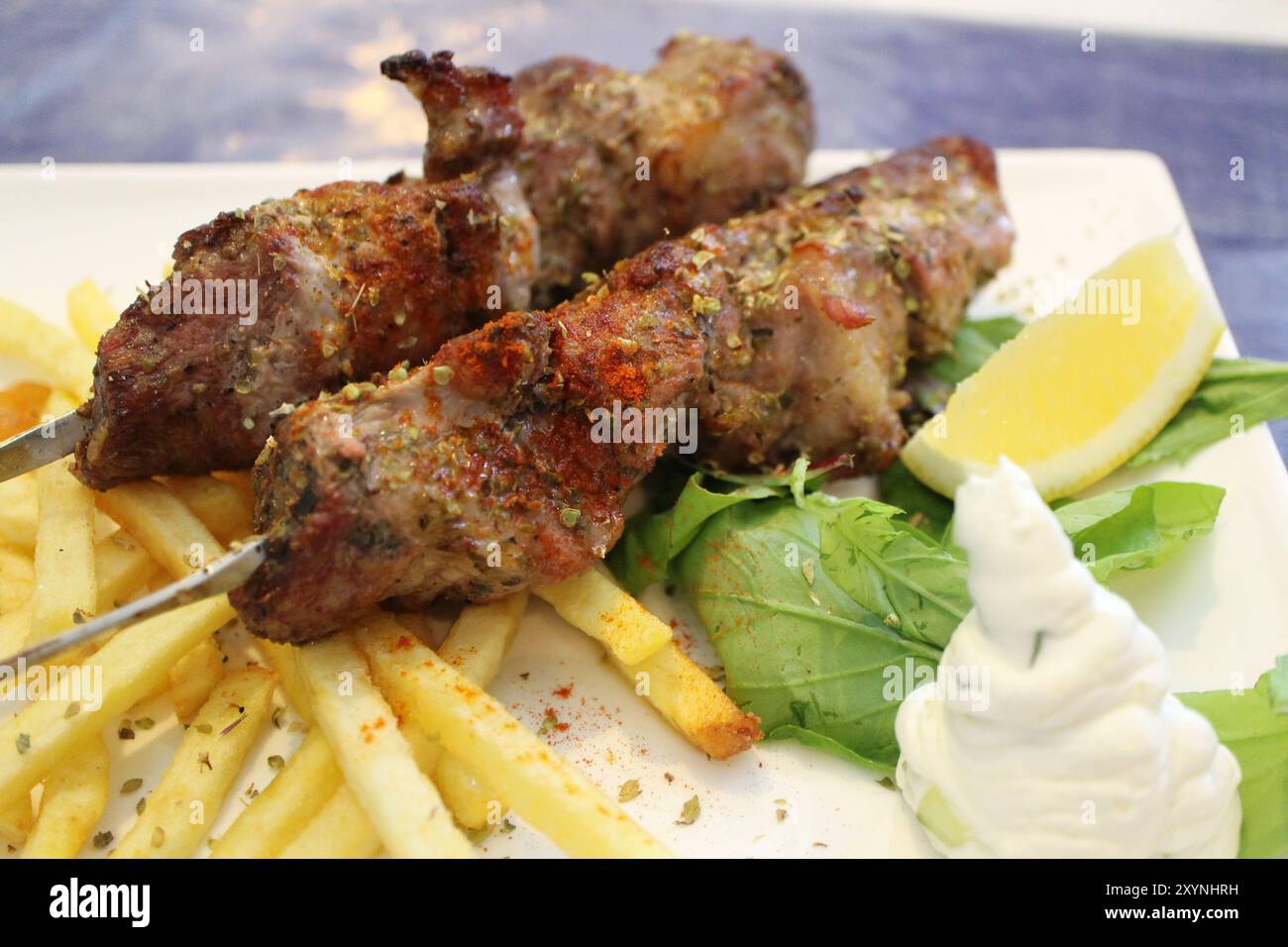 Greek cuisine: pork souvlaki (grilled pork Stock Photo - Alamy
