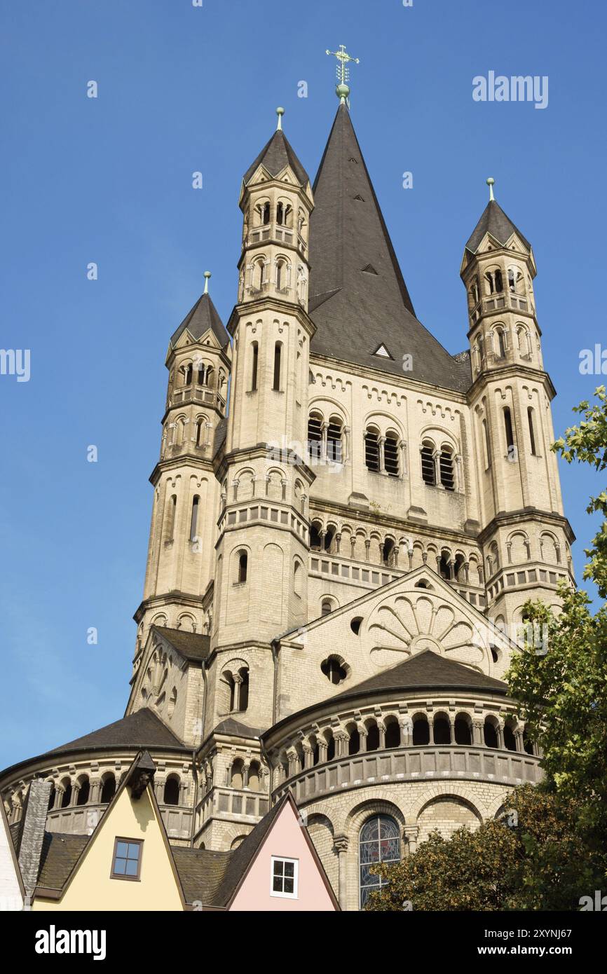 The massive tower of Great Saint Martin Church and ancient colored ...