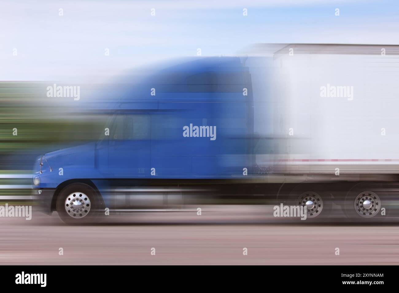 Truck fast moving Stock Photo - Alamy