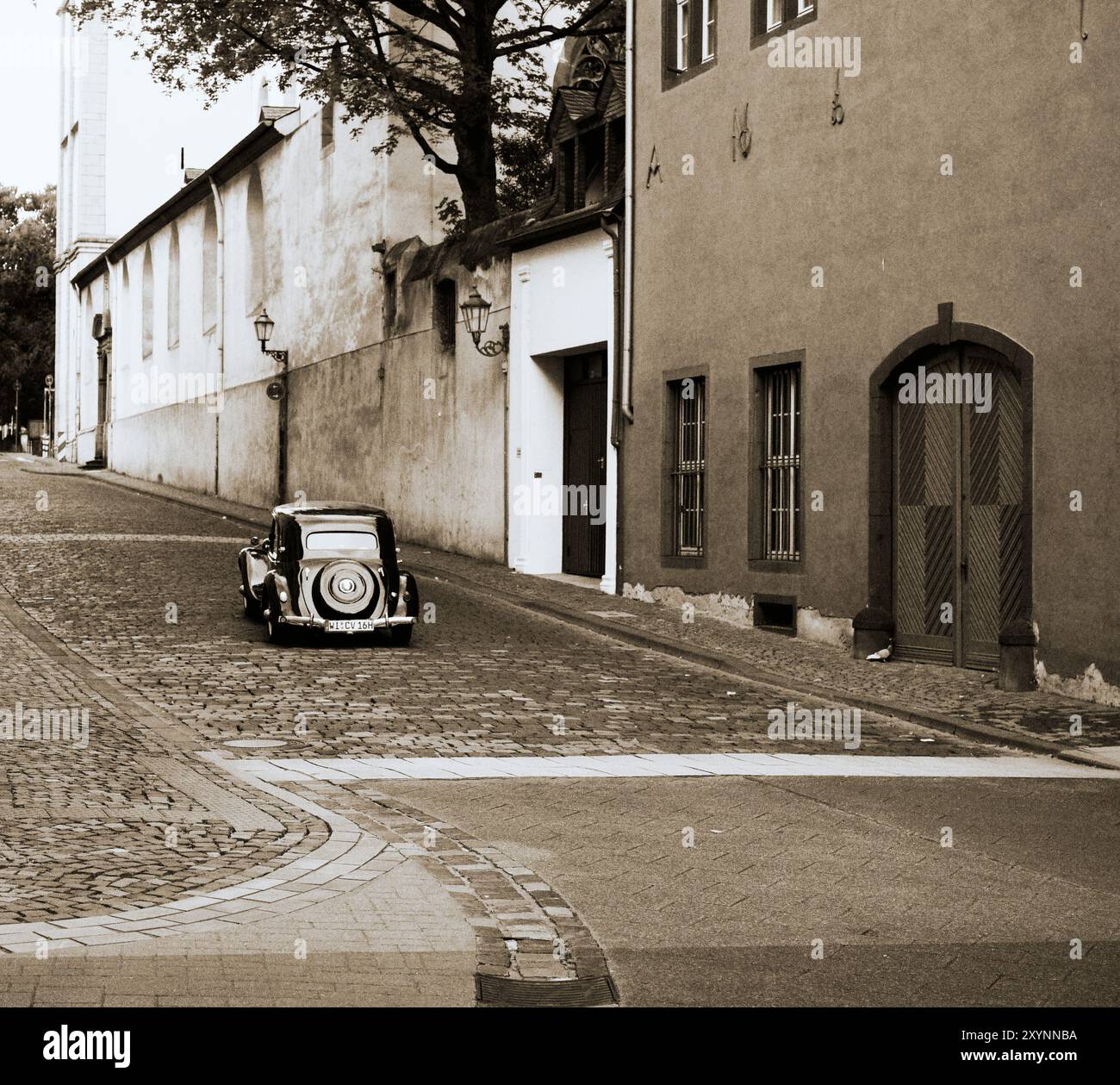 Vintage sepia tone scene of an old 1940's or earlier vintage black ...