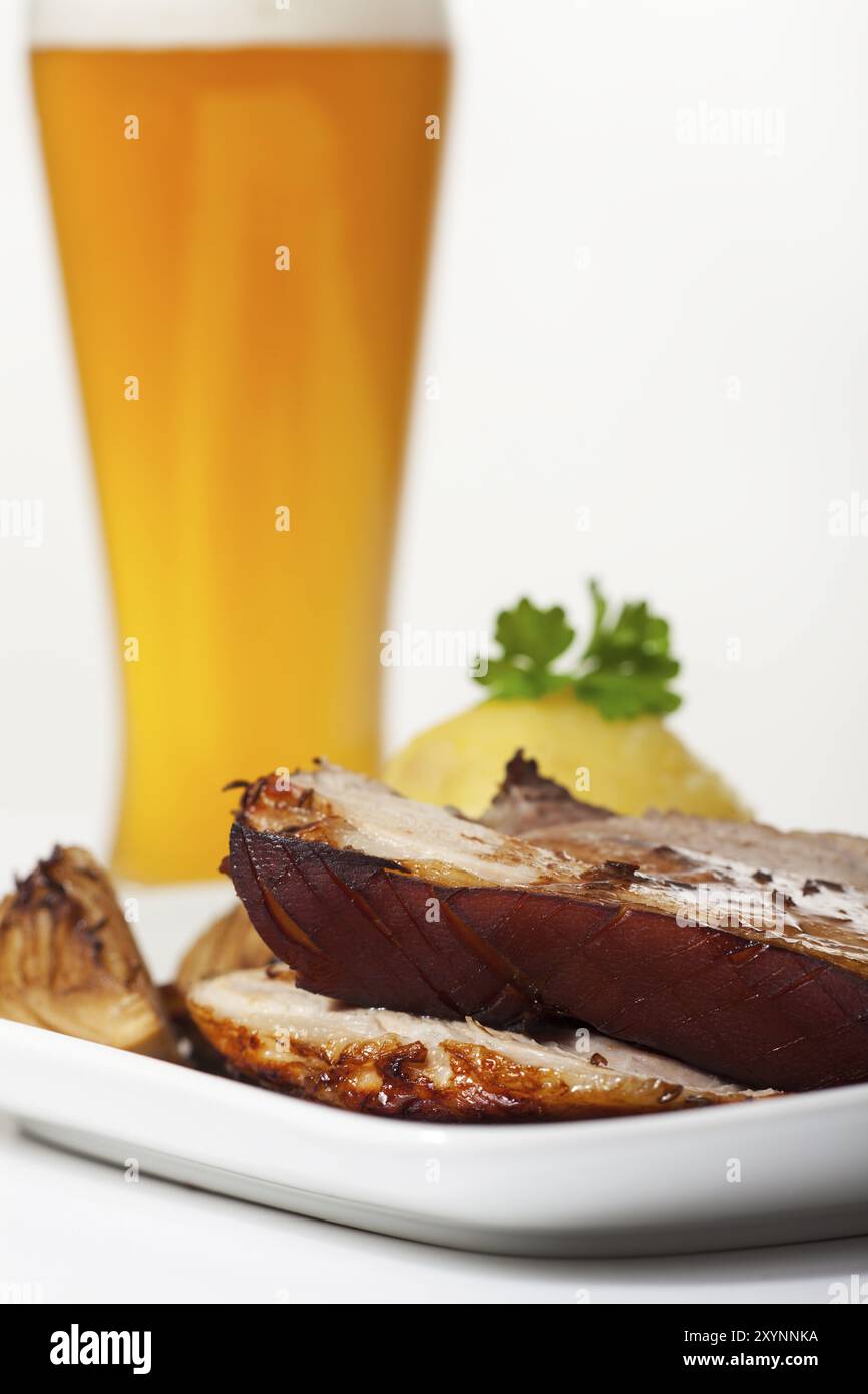Roast pork with dumplings and wheat beer Stock Photo - Alamy