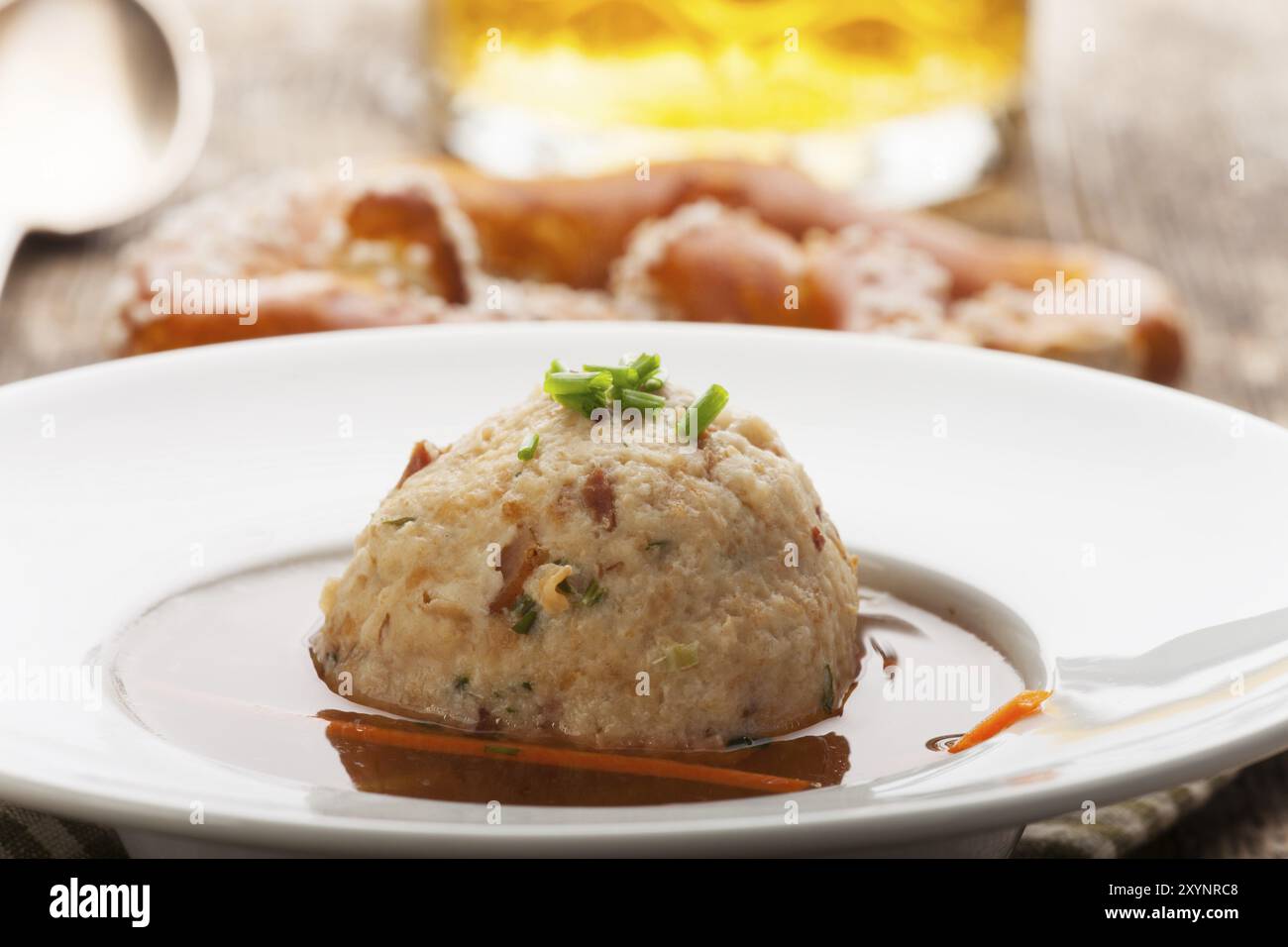Bacon dumplings in broth Stock Photo - Alamy