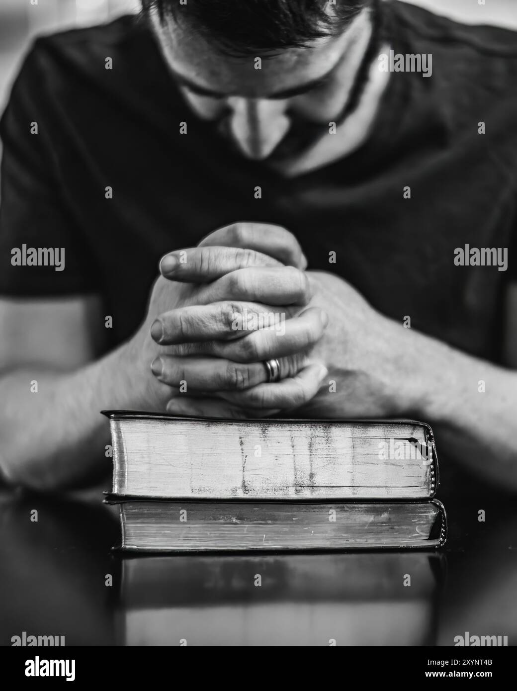 Christian man reading for bible study hi-res stock photography and ...
