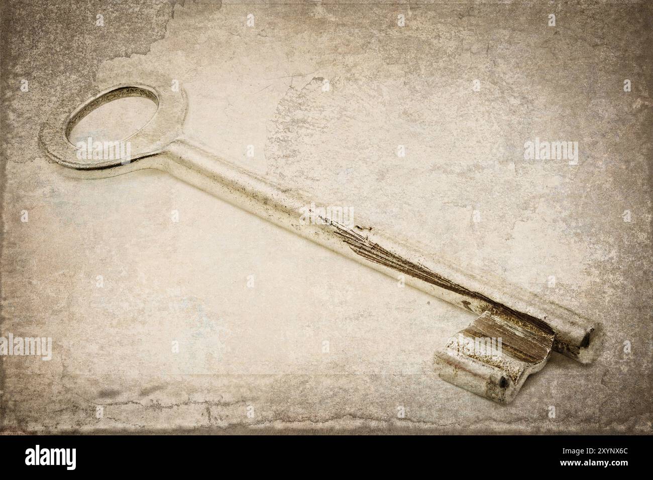 Single key on textured background Stock Photo - Alamy