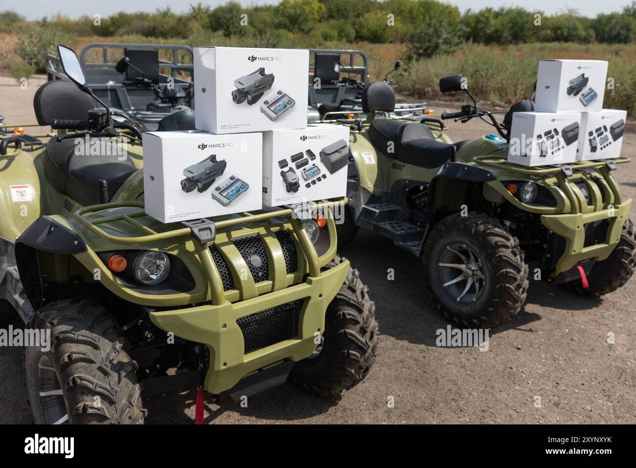 Quad bikes and a batch of Mavik drones are seen before their transfered ...