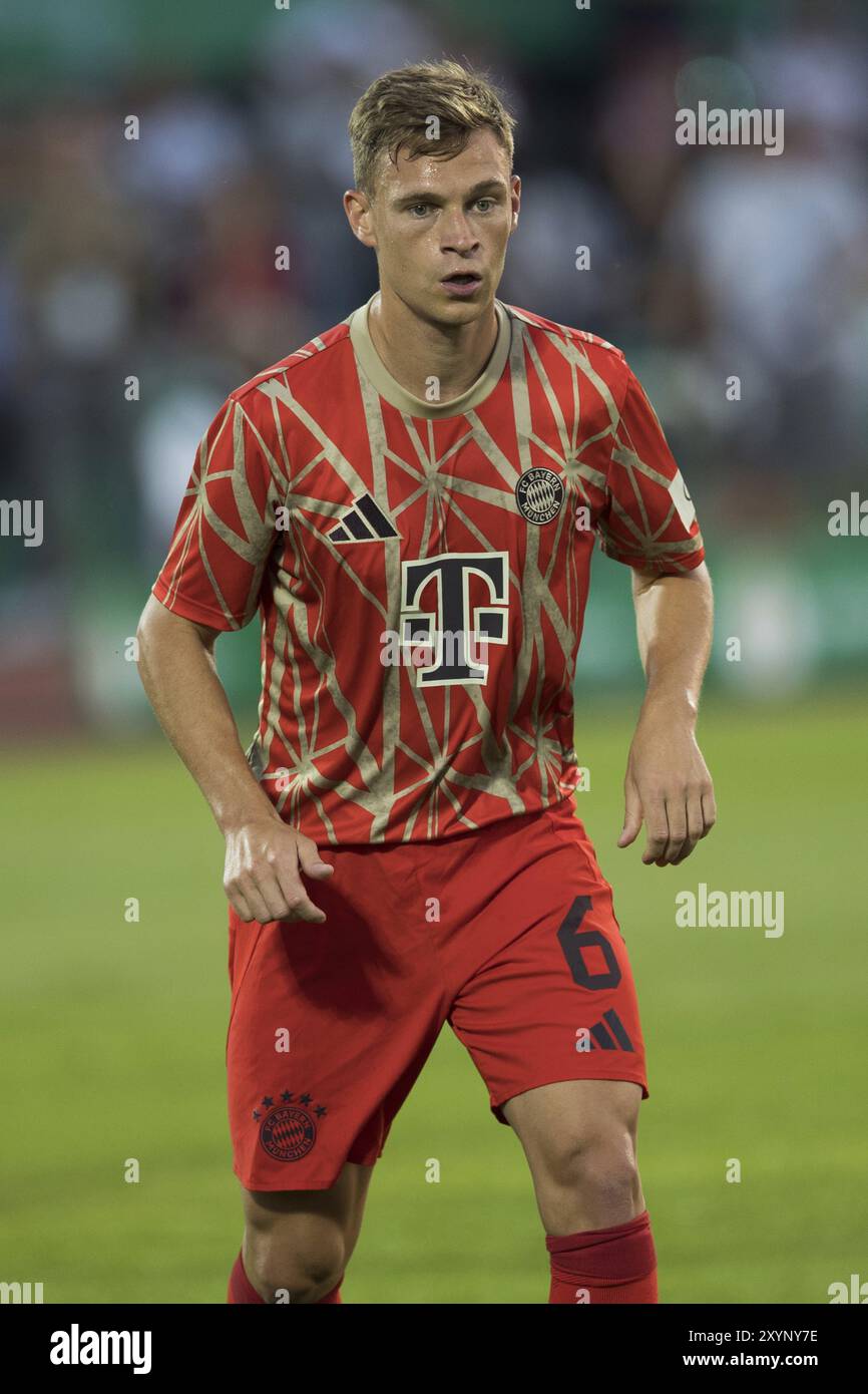 Football match, Joshua KIMMICH FC Bayern Munich warming up in front of ...