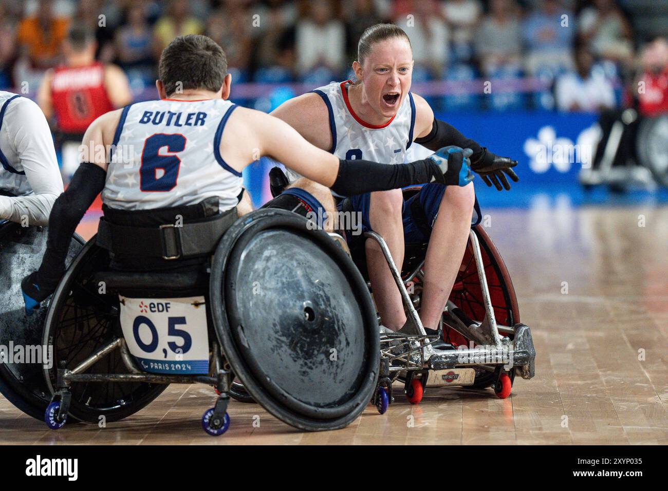 Sarah Adam (8) of the USA celebrates with teammate Jeff Butler (6 ...