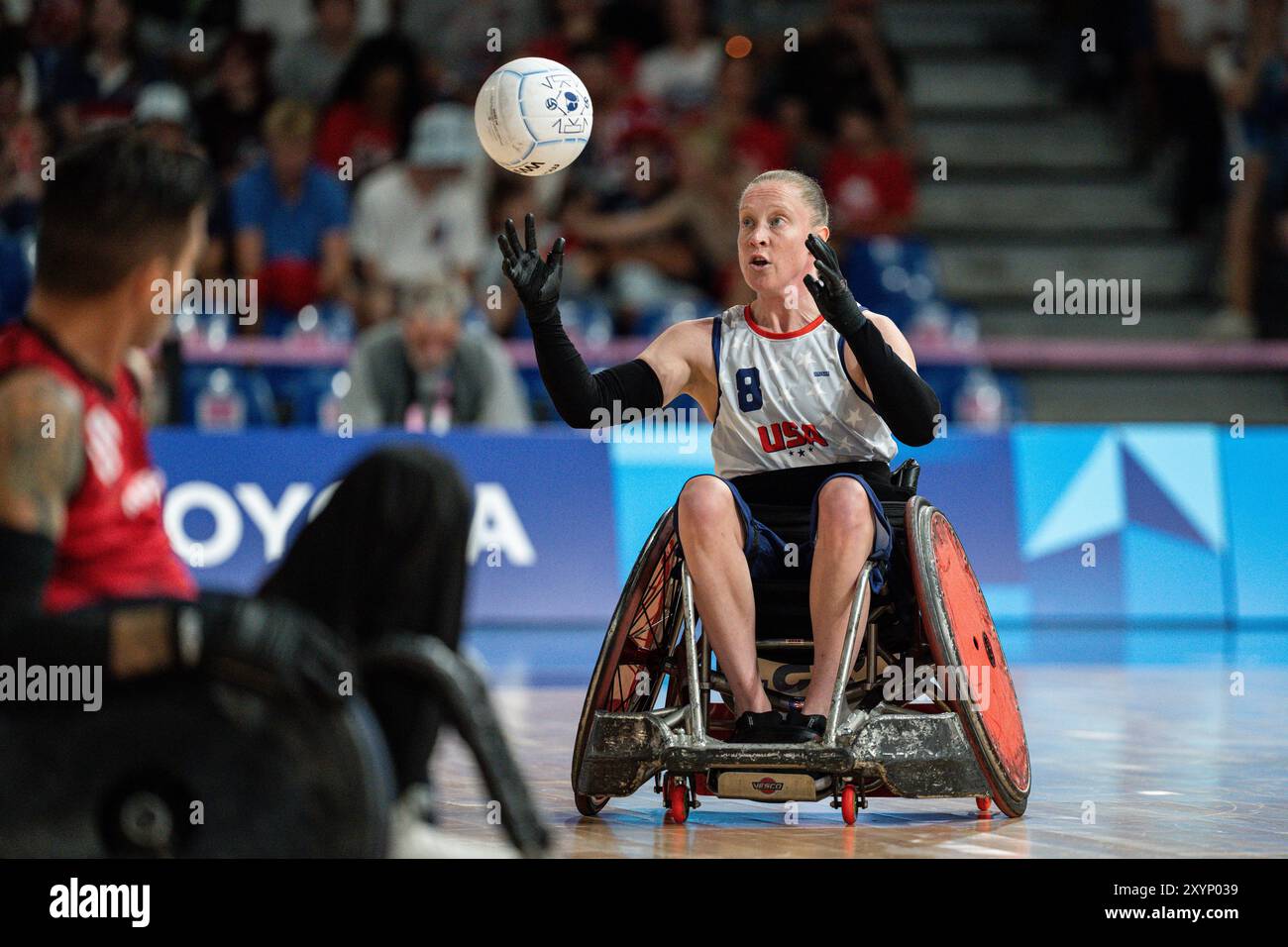 Sarah Adam (8) of the USA catches the ball during a wheelchair rugby ...